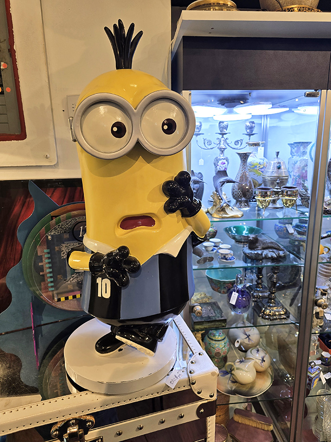 Even cartoon characters find retirement homes in antique stores. This Minion stands guard over treasures far more valuable than bananas.