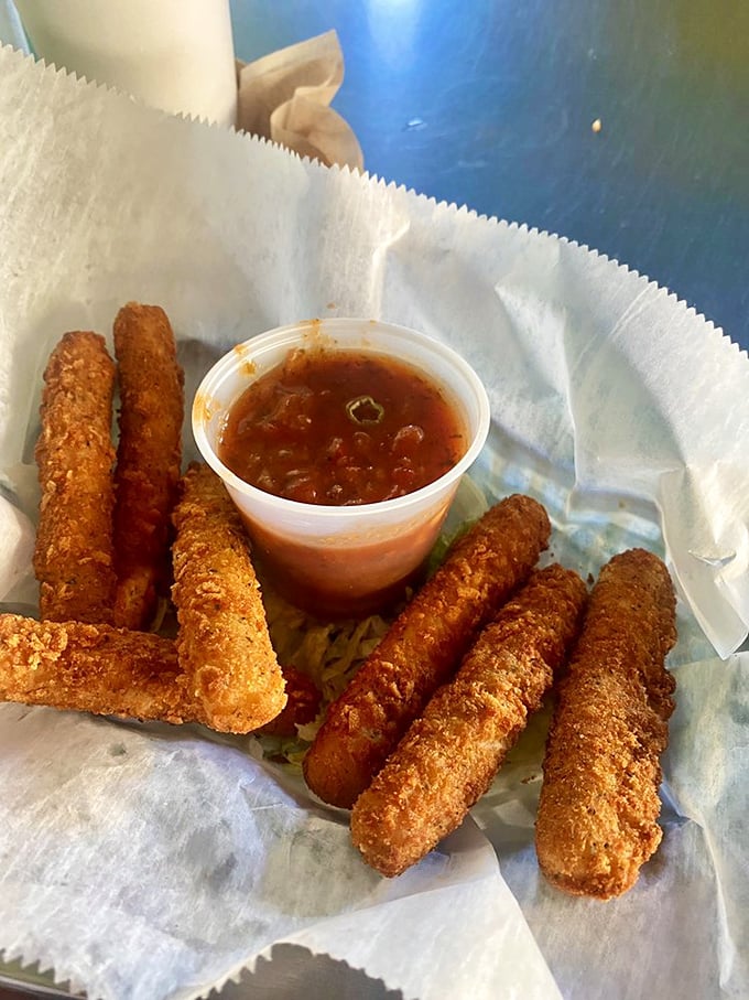 Mozzarella sticks that achieve the perfect cheese-pull-to-crunch ratio, with marinara sauce that deserves more respect than being called "dipping sauce."