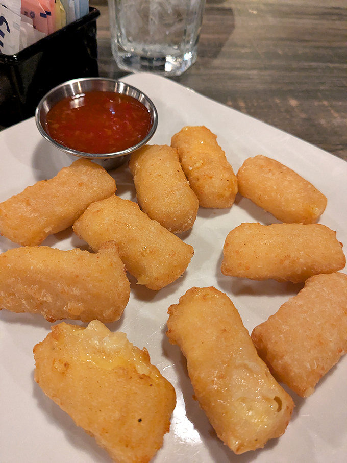 Golden-fried perfection with a side of tangy sauce&mdash;these aren't just appetizers, they're the opening act that threatens to steal the show.