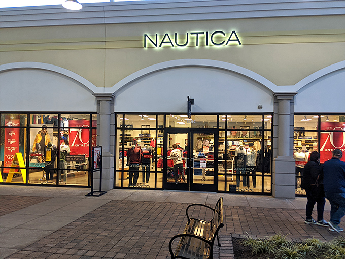 Nautica: bringing the nautical aesthetic to landlocked shoppers everywhere. Those red sale signs are like lighthouses guiding you to savings. 