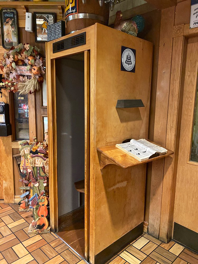 Even the phone booth exudes character. In an age of smartphones, it stands as a wooden sentinel to communication methods of yesteryear.
