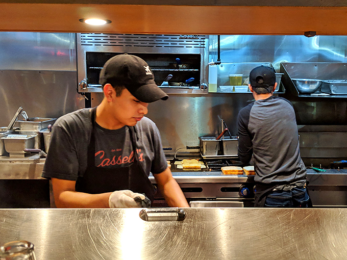 Behind the scenes, focused professionals work their magic on the grill&mdash;the unsung heroes of your impending food happiness.