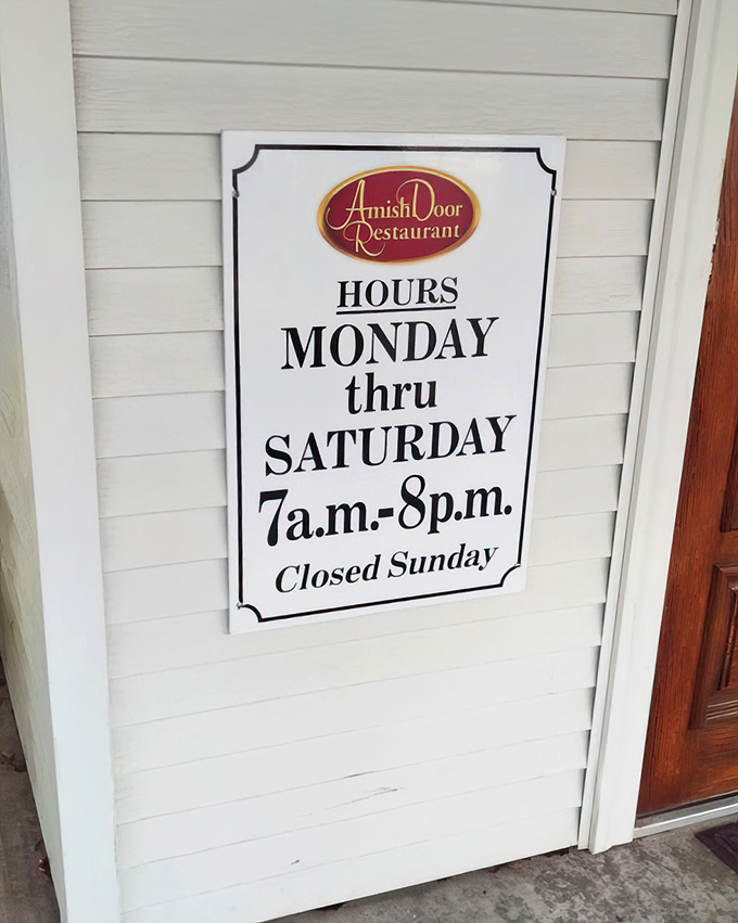 The hours sign reveals the secret to perfect comfort food—they're closed Sundays because even mashed potato perfection requires a day of rest.