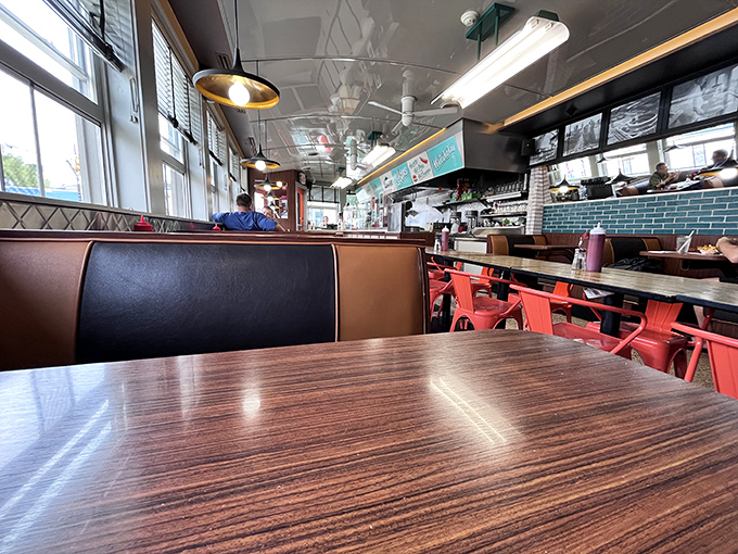 From this booth vantage point, you can survey the kingdom of comfort food while plotting which menu item deserves your attention next.