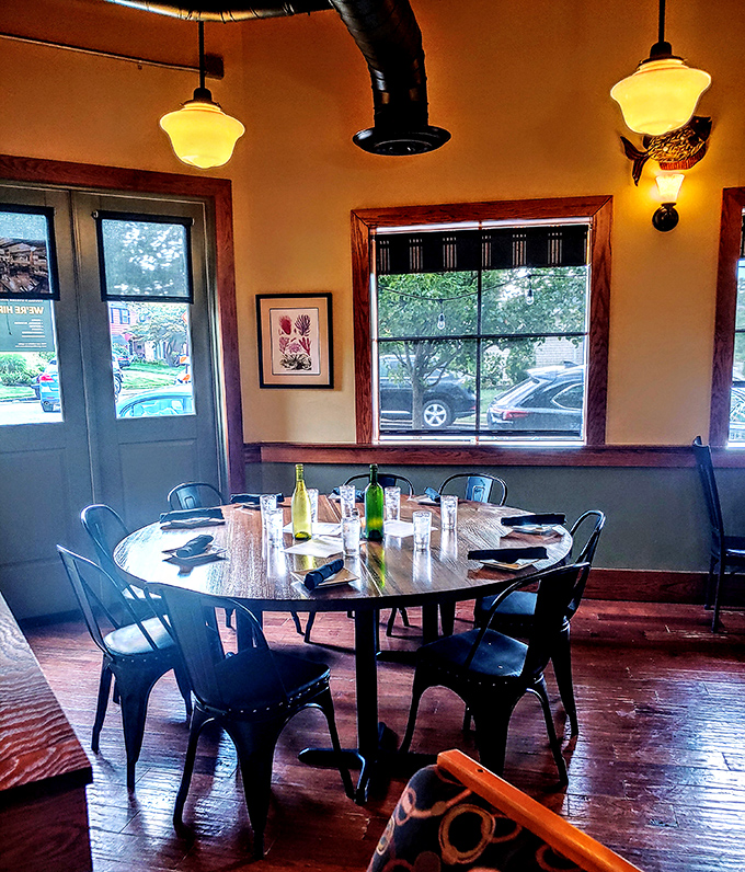This cozy corner table bathed in natural light is where first dates become second dates, and "just one more bite" becomes the evening's mantra.