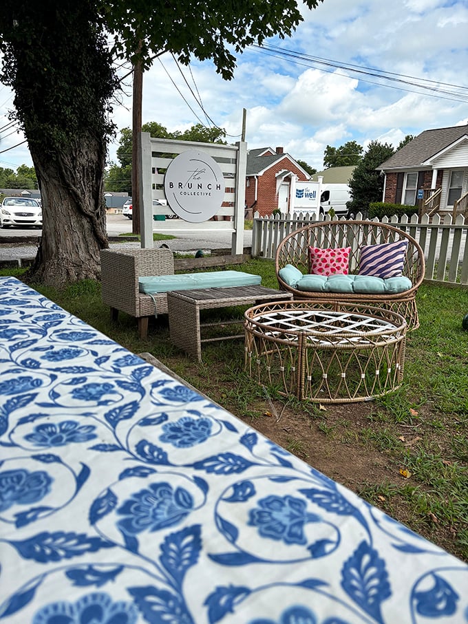 The outdoor lounge area feels like the coolest corner of your friend's garden party, complete with wicker furniture and patterned pillows.