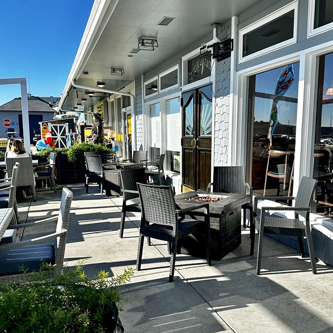 Sun-drenched outdoor seating where the ocean breeze serves as both ambiance and appetizer.