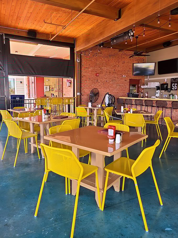 Those yellow chairs pop like sunshine &ndash; perfect for people-watching while you wait for takeout perfection.
