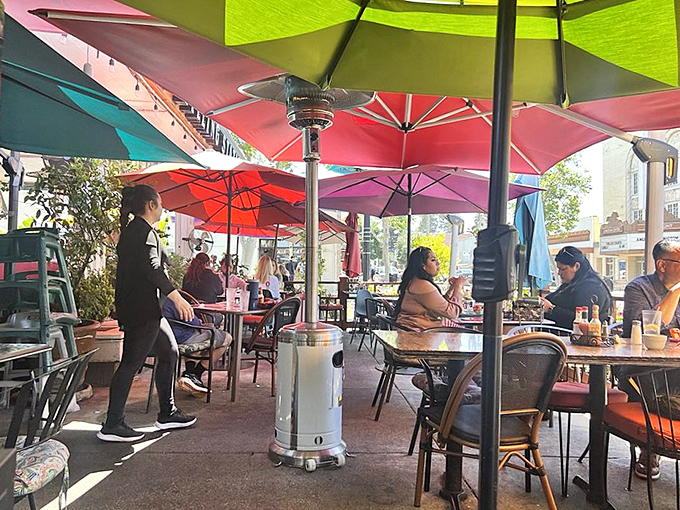 The outdoor patio's rainbow of umbrellas creates the perfect setting for lingering over coffee and contemplating a second breakfast.
