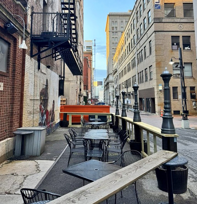 Urban dining with a view of Columbus architecture. This alley patio transforms from forgotten space to coveted seats when Ohio's weather cooperates.