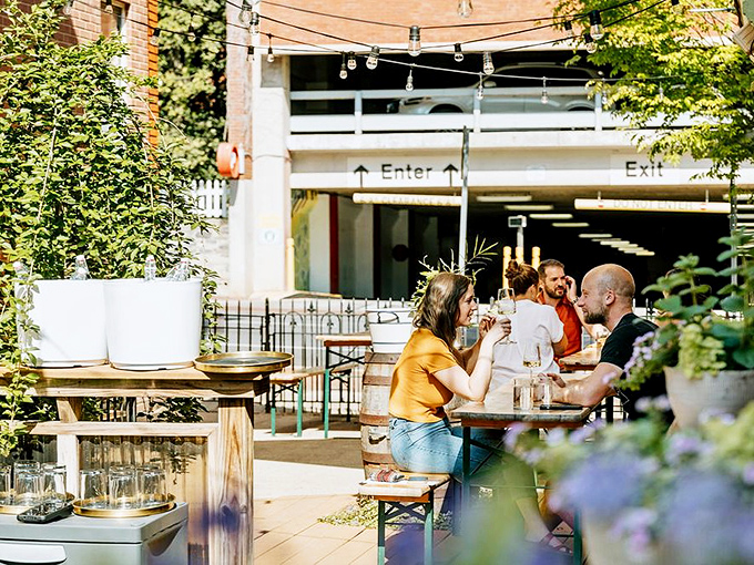 Outdoor dining perfection where string lights and good company create magic in downtown Lancaster's heart.