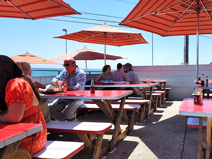 Orange umbrellas, ocean breezes, and seafood that tastes like it jumped from the water to your plate.