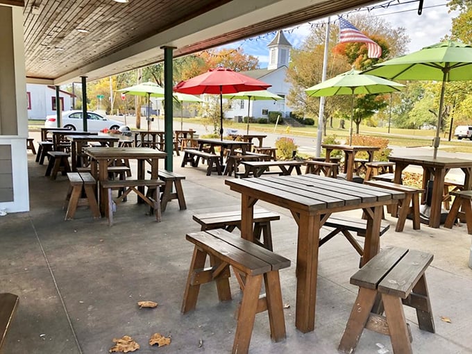 The Mug's charming sign featuring their pig mascot stands as a beacon of hope for hungry travelers. Like a lighthouse, but for your stomach.