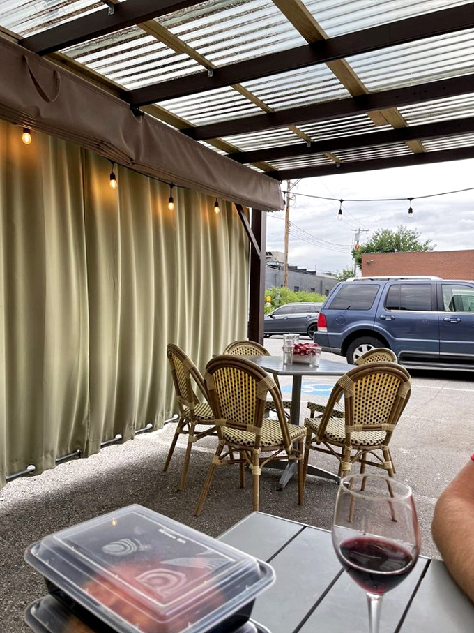 Outdoor seating that captures that "somewhere in Europe" feeling, where a glass of wine and takeout container somehow feel incredibly sophisticated.