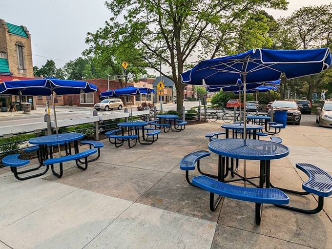 When Wisconsin weather cooperates, these blue umbrella tables offer the perfect spot to enjoy your Blue Plate special al fresco.