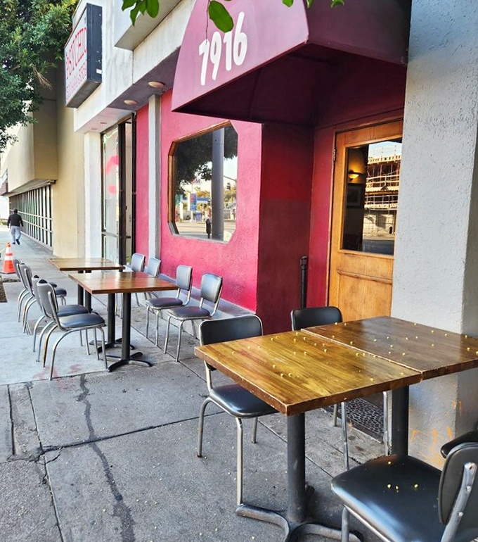Outdoor seating for those brave souls who prefer fresh air with their food coma. The wooden tables have heard a thousand "Oh my god" reactions.