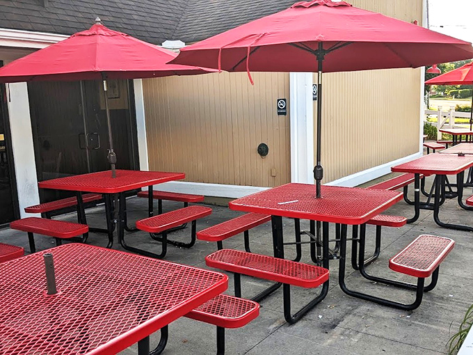 Red tables under bright umbrellas&mdash;the perfect spot for summer feasting. Because sometimes BBQ tastes even better with a side of fresh air.