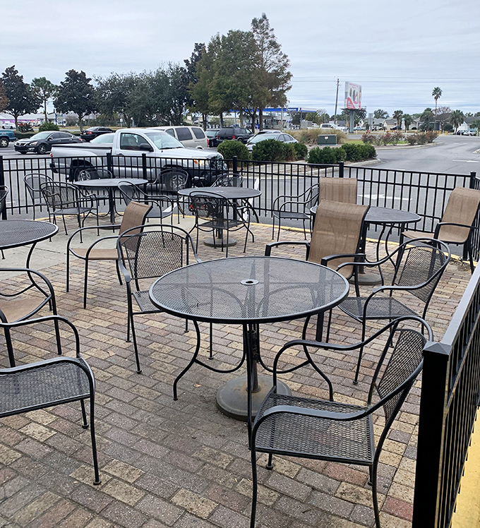 The outdoor patio stands ready for those magical Florida mornings when the Gulf breeze makes dining al fresco irresistible.