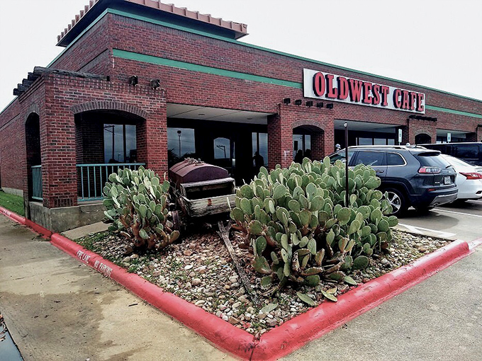 Prickly pear cacti guard the entrance like spiny sentinels, welcoming hungry travelers to this brick-and-mortar breakfast oasis.