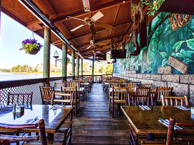 The outdoor dining area offers waterfront views with a side of fresh air &ndash; proving that sometimes the best jungle experience includes a gentle breeze.