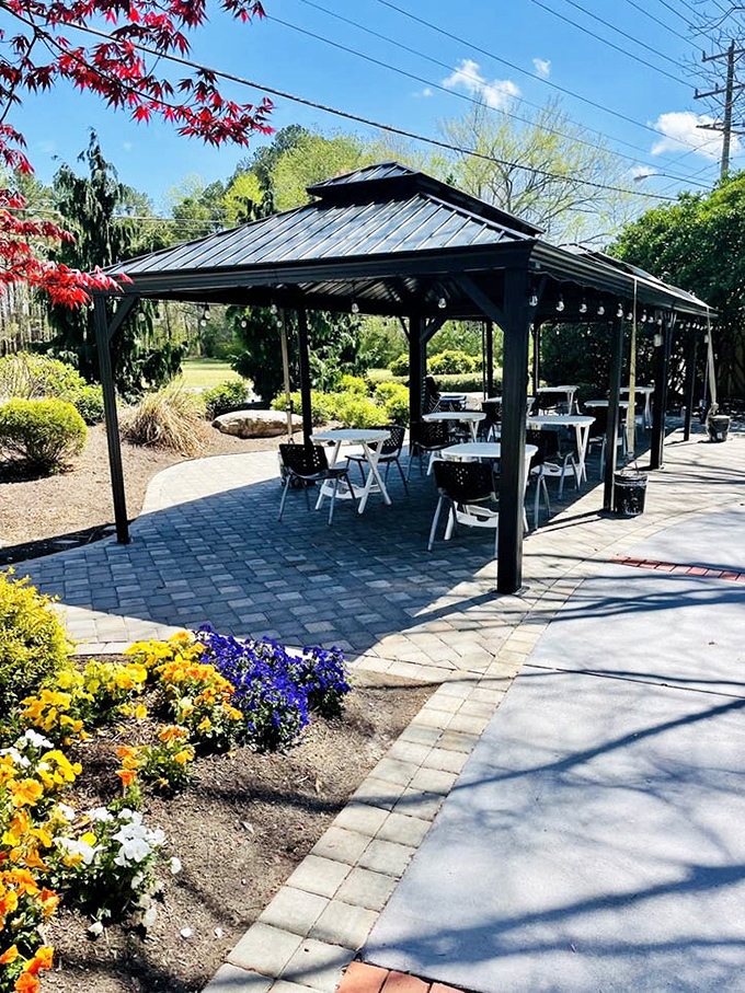 The outdoor pavilion offers al fresco dining surrounded by gardens &ndash; because pancakes taste even better with a side of fresh air and birdsong.