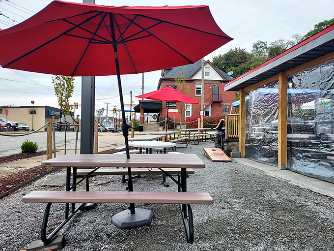 Red umbrellas provide shade while you contemplate your next delicious decision in this outdoor barbecue paradise.