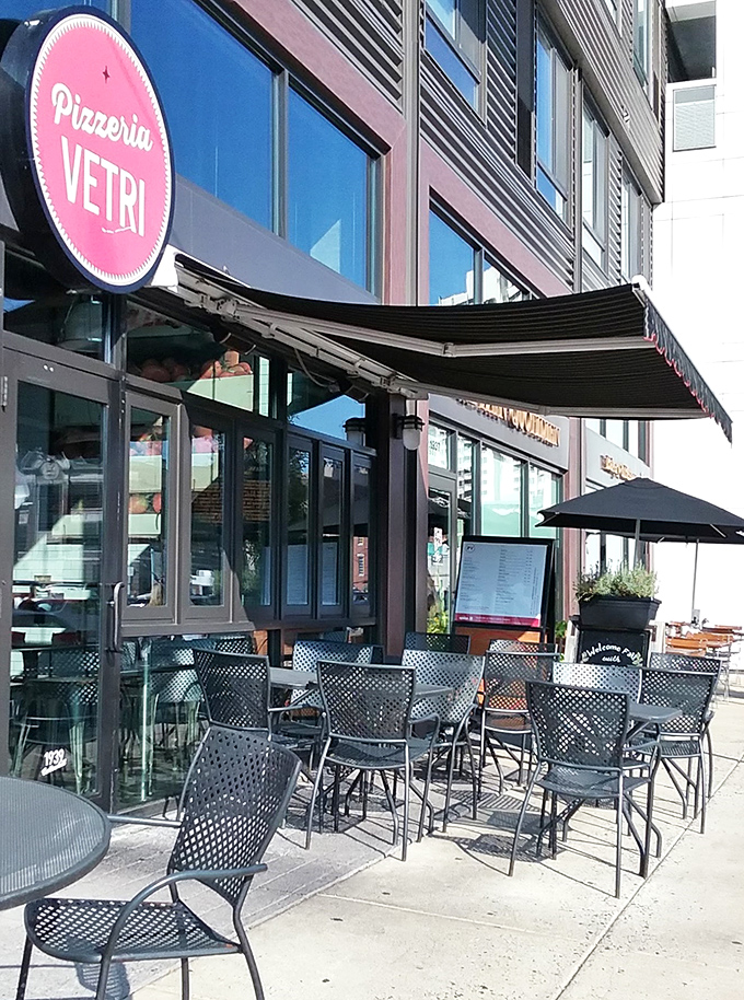 The sidewalk seating says "casual," but the food says "I've been preparing for this moment my entire culinary life."