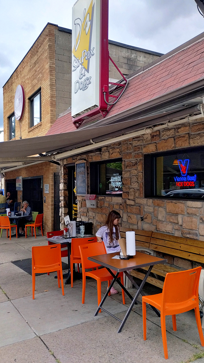 Bright orange chairs and outdoor seating for those perfect Pennsylvania days when eating a cheesesteak under blue skies feels like winning at life.