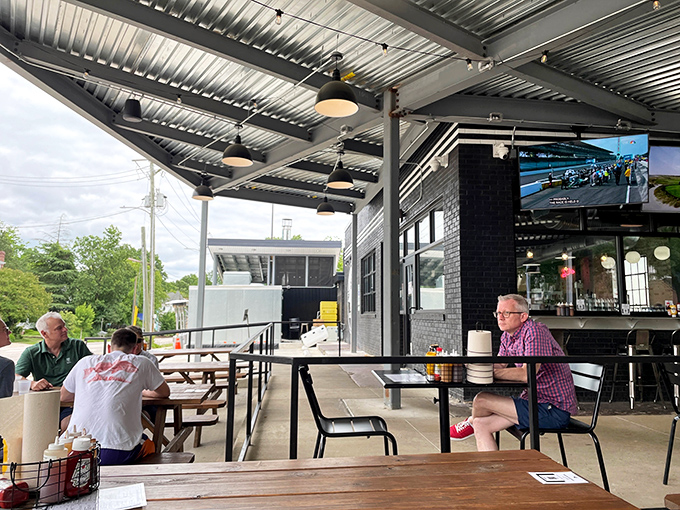 Outdoor seating that strikes the perfect balance between casual and comfortable &ndash; where barbecue meets fresh air under Carolina skies.