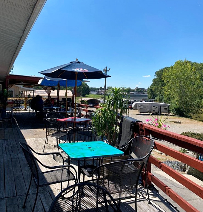 The riverside deck isn't trying to be fancy, but with views like this, who needs white tablecloths? Nature provides the ambiance here.