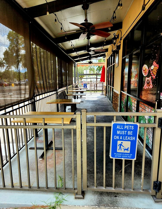 The covered patio offers al fresco dining with ceiling fans that keep the Florida heat at bay while you enjoy your meal.