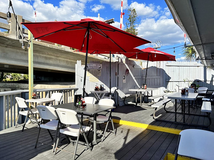 Outdoor seating that puts you between sky and water. These red umbrellas have witnessed countless first dates, anniversaries, and "just because" celebrations.