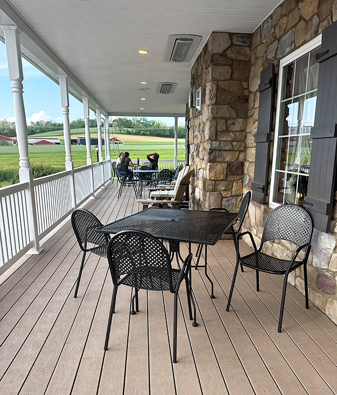 The wraparound porch offers pastoral views that pair perfectly with a scoop of homemade ice cream &ndash; nature's ideal backdrop for dairy indulgence.