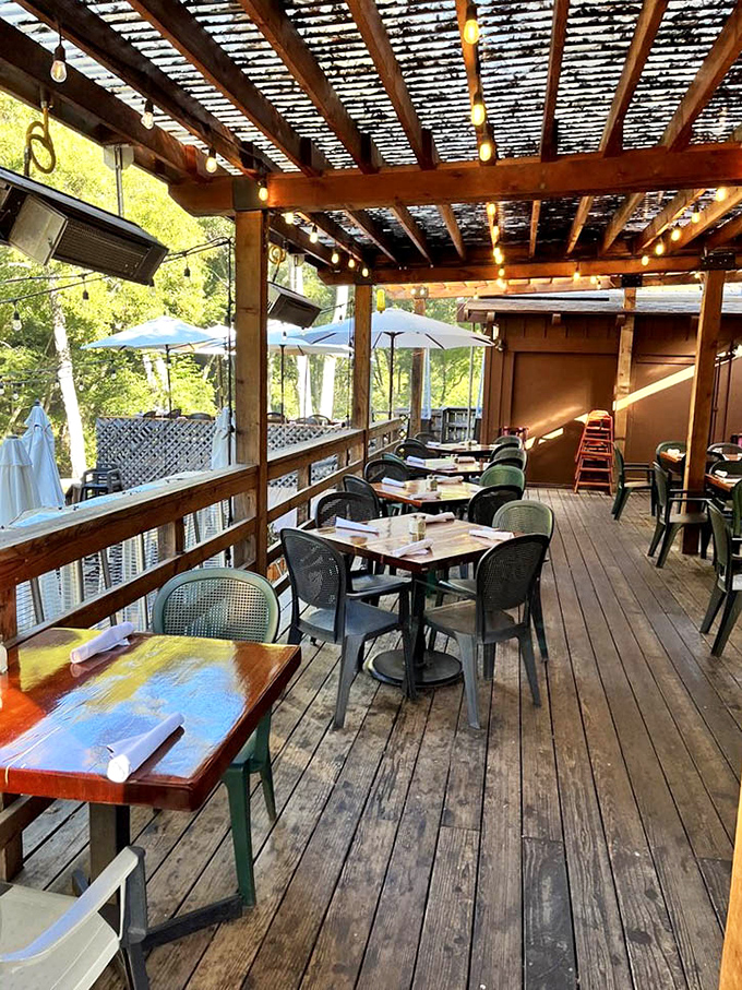 Dappled sunlight through the pergola creates nature's own mood lighting. Al fresco dining elevated to an art form.