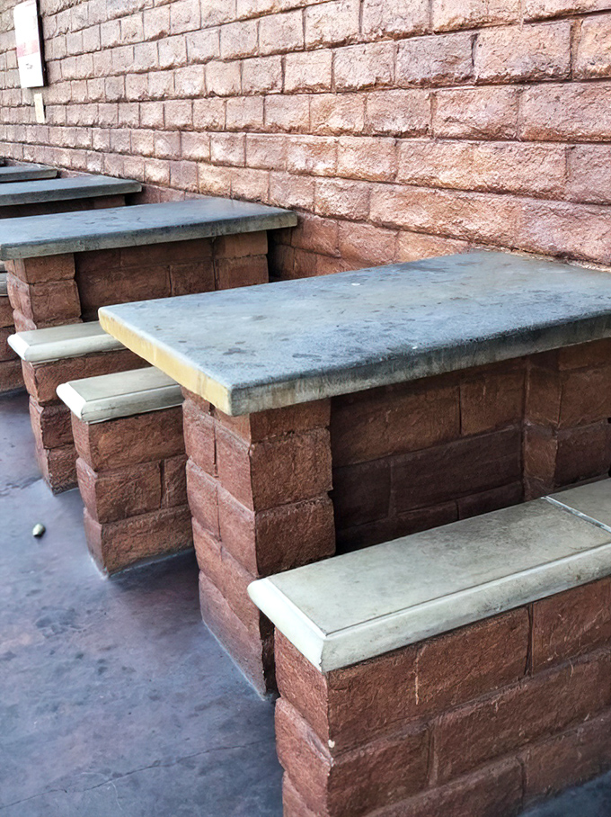 These stone benches have witnessed countless first bites, food comas, and the silent nodding that accompanies truly transcendent sandwiches.