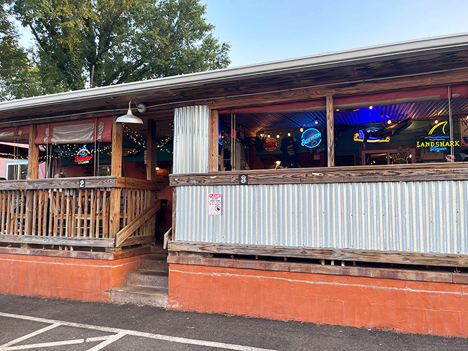 As evening falls, the patio's twinkling lights transform this humble fish house into the kind of place where summer memories are made.