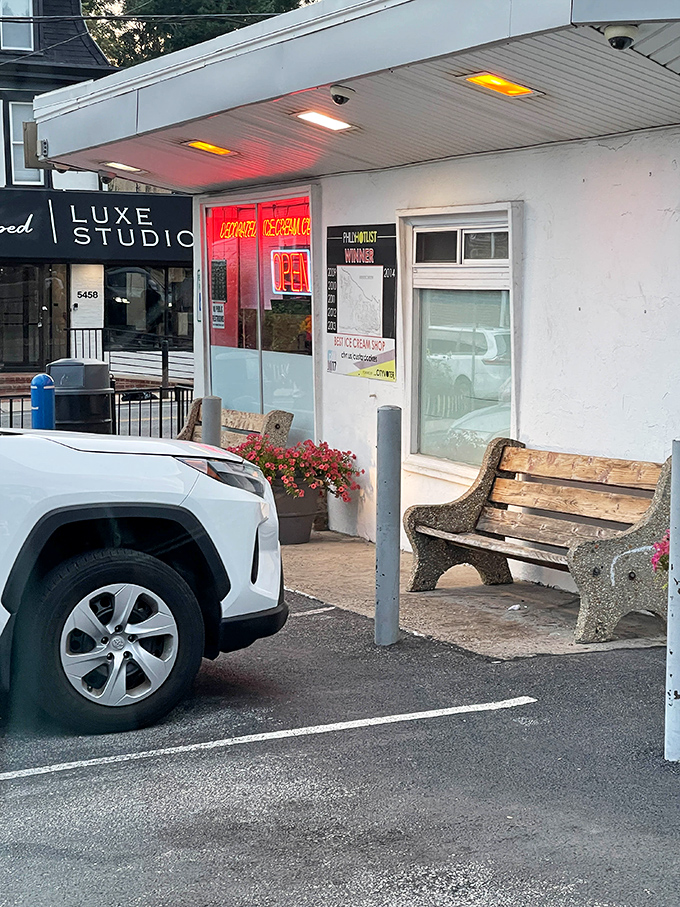 The humble bench outside isn't just seating&mdash;it's front-row tickets to the best show in town: people experiencing pure ice cream joy.