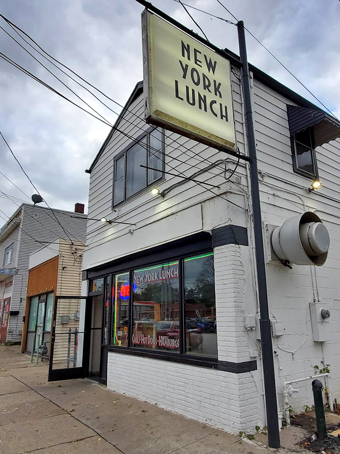 Even on cloudy days, New York Lunch's exterior radiates the quiet confidence of an establishment that doesn't need to shout about its greatness.