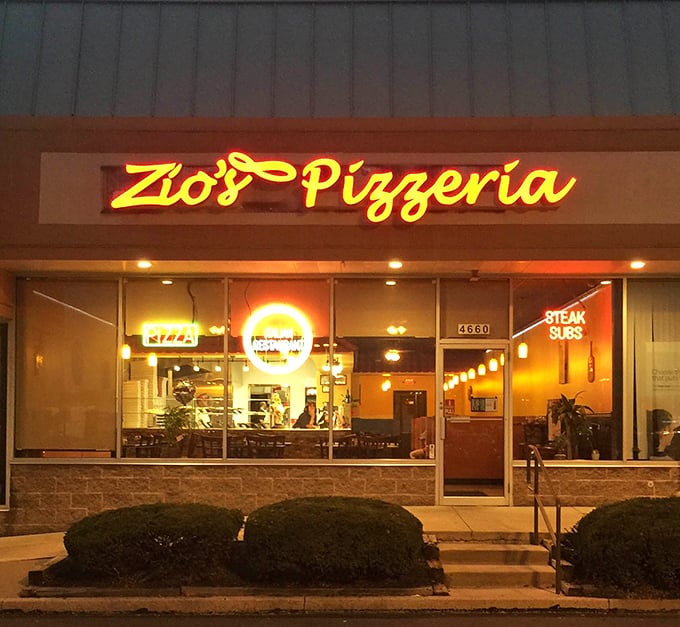 By night, Zio's glows like a beacon of hope for the hungry. Even the shrubs seem excited about the pizza possibilities.
