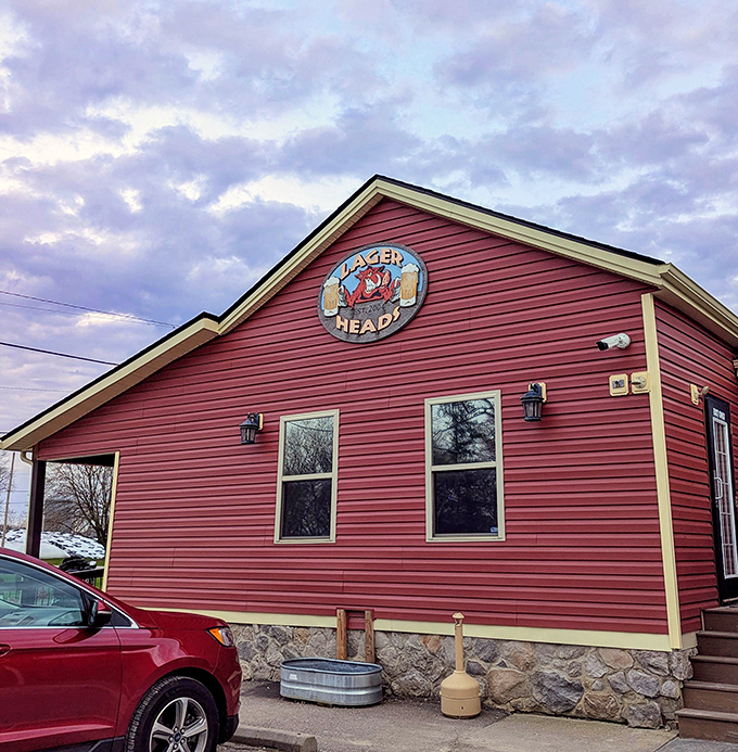 The iconic red exterior and vintage sign have become a landmark for meat pilgrims seeking smoky salvation in Northeast Ohio.