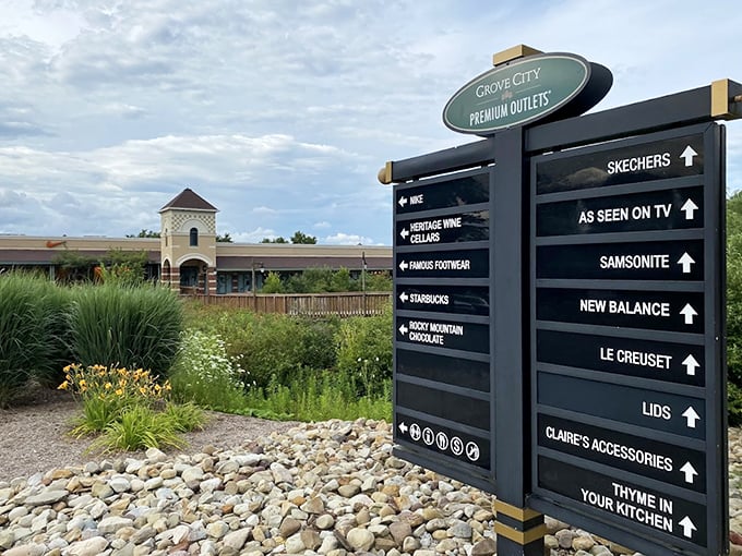 Navigation made stylish. This sign doesn't just point the way &ndash; it builds anticipation for the retail adventures that await around each corner.