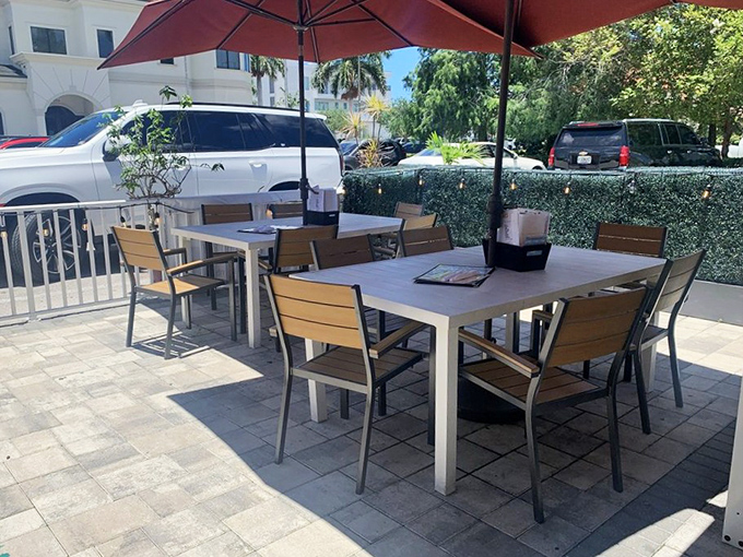 Outdoor seating under Florida skies&mdash;because sometimes you need vitamin D with your vitamin Delicious.