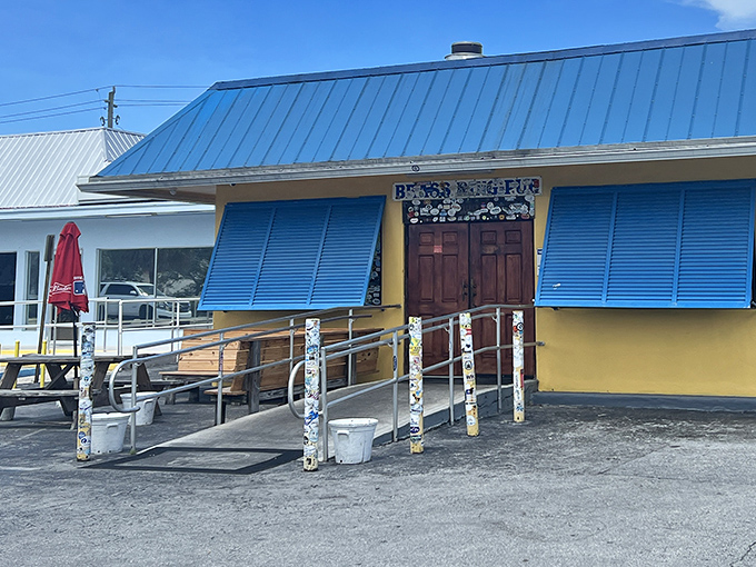 The entrance ramp decorated with stickers tells stories of visitors past – each one a testament to someone's excellent taste in burgers.