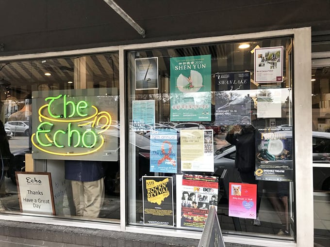 The neon window sign glows like a lighthouse for the breakfast-starved. Those community flyers tell you this isn't just a restaurant; it's a neighborhood hub.