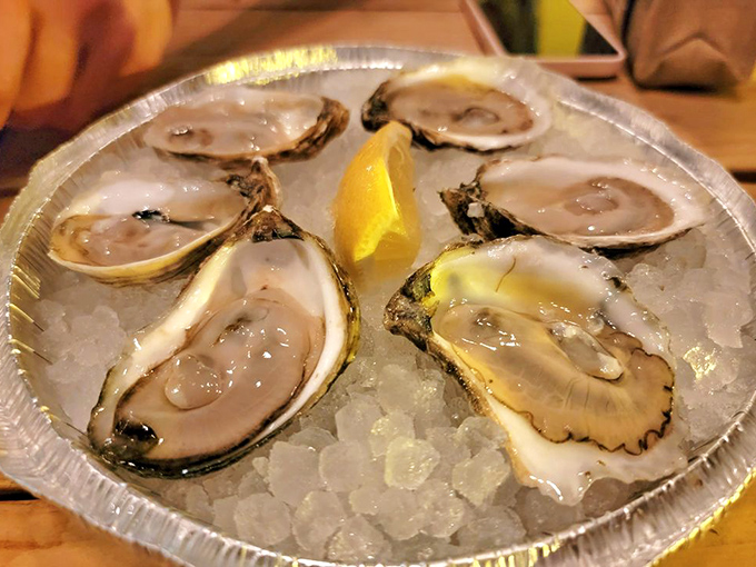 Fresh oysters on ice with a squeeze of lemon&mdash;nature's perfect appetizer and the ocean's most elegant calling card, glistening like jewels from the deep.