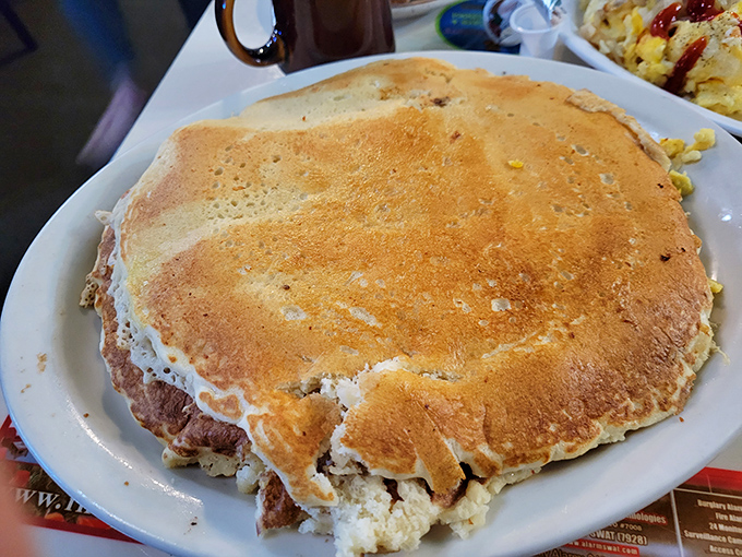 This pancake isn't just large&mdash;it's territorially ambitious. If pancakes were real estate, this one would be beachfront property in Malibu.