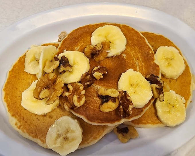 Pancakes adorned with bananas and walnuts &ndash; nature's way of suggesting that dessert for breakfast is perfectly acceptable adult behavior.