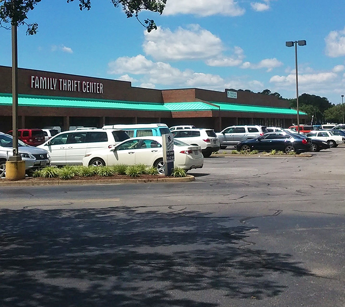 Parking lot packed with treasure seekers' vehicles. Each car represents someone inside having their "Eureka!" moment over a $3 cashmere sweater. 