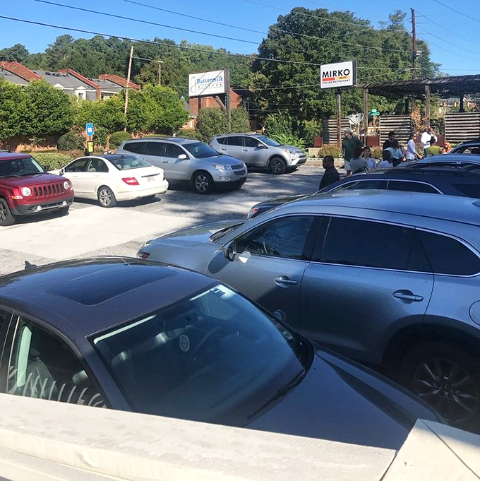 The packed parking lot tells the real story&mdash;these aren't just cars; they're evidence of a breakfast pilgrimage that locals deem absolutely necessary.