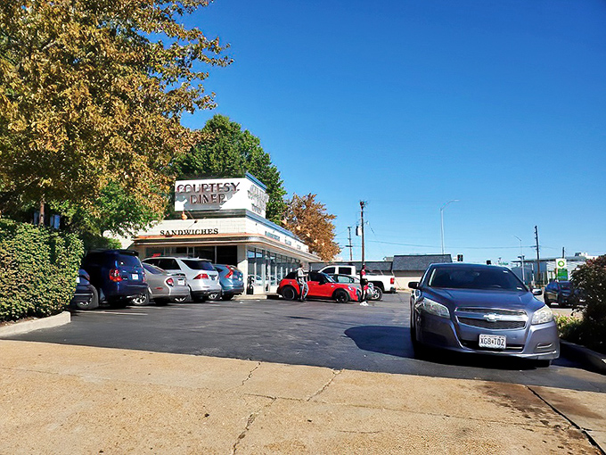 Even on the brightest day, that classic diner silhouette promises a cool refuge where calories don't count and coffee refills are endless.